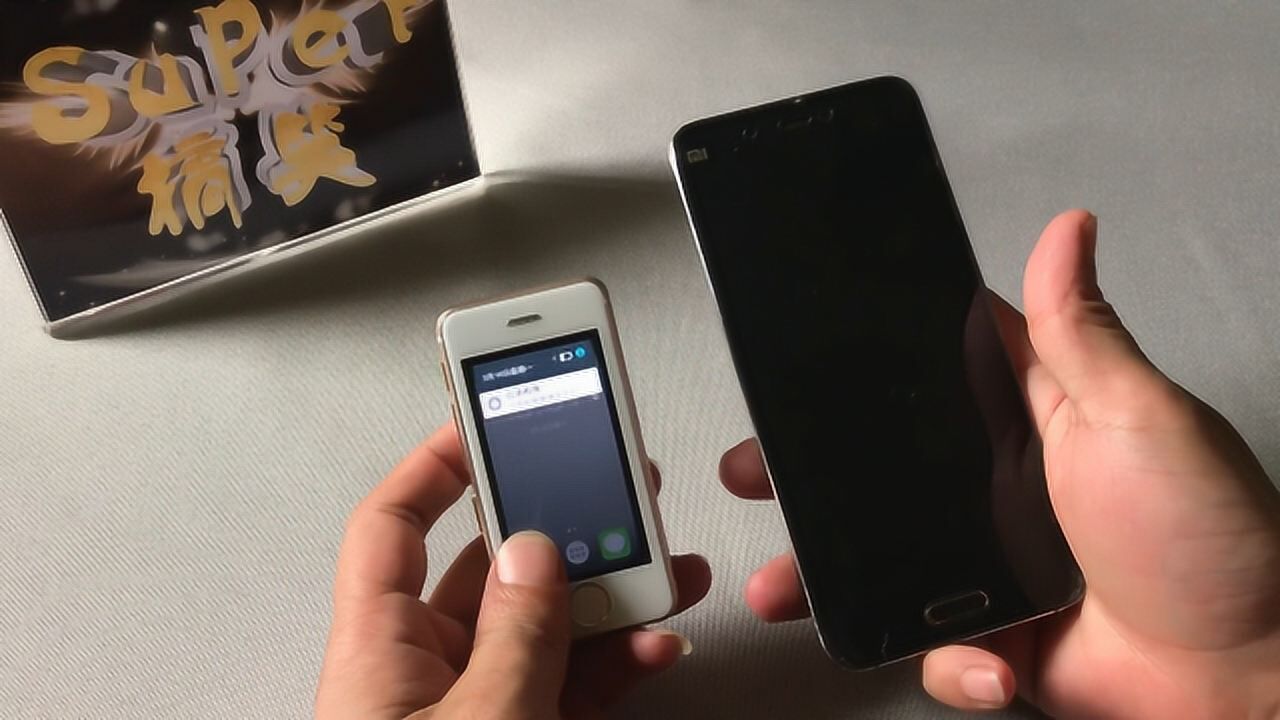 网购国产迷你iPhone手机开箱，小得让人心动，299入手值不值？_腾讯视频