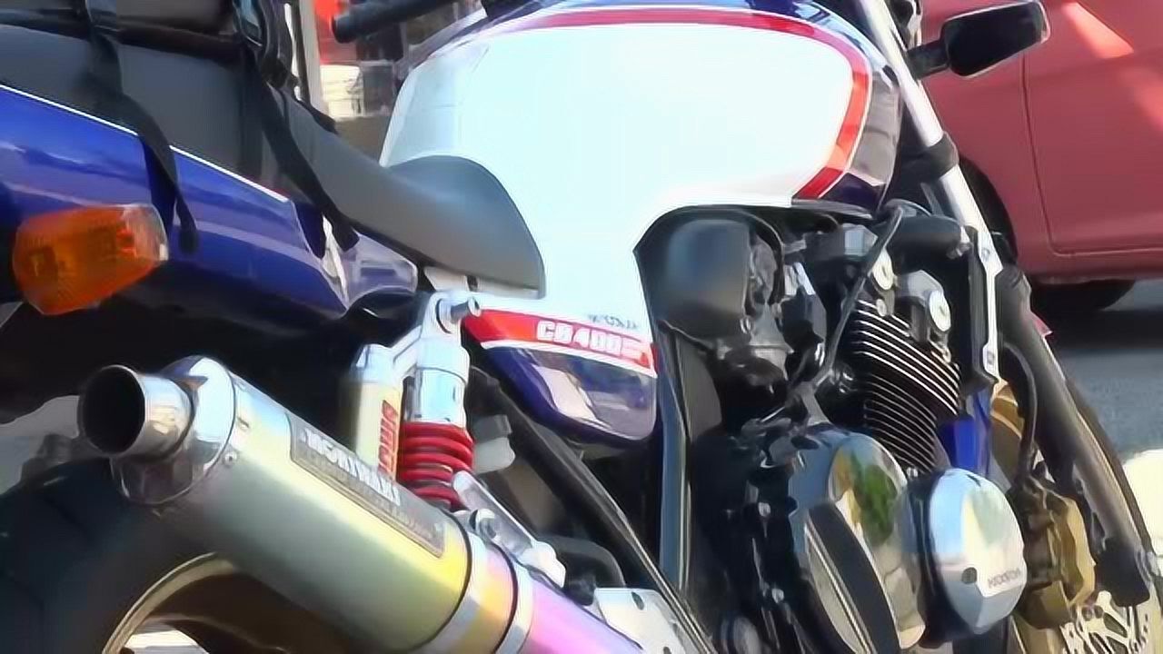 这个大叔的的honda本田CB400SF的配色挺少见的，车是VTEC2代NC39的_腾讯视频